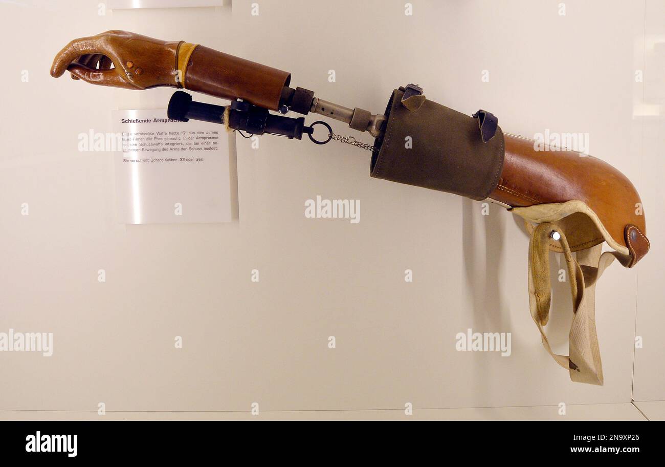 An arm prosthesis with a gun is on display at the new spy museum in ...