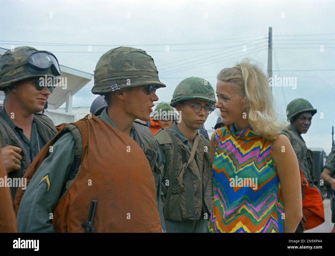 An unidentified former Miss America chats with U.S. GIs in Vietnam, Aug ...
