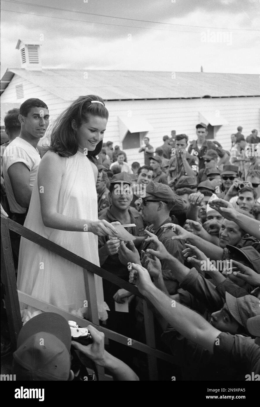 American Gis in Saigon cluster around Jane Anne Jayroe, this year's ...