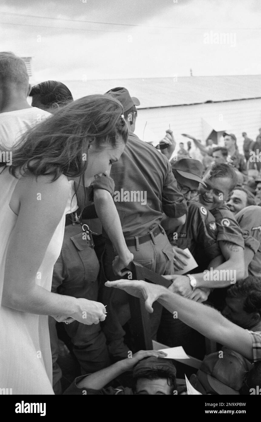 American Gis in Saigon cluster around Jane Anne Jayroe, this year's ...