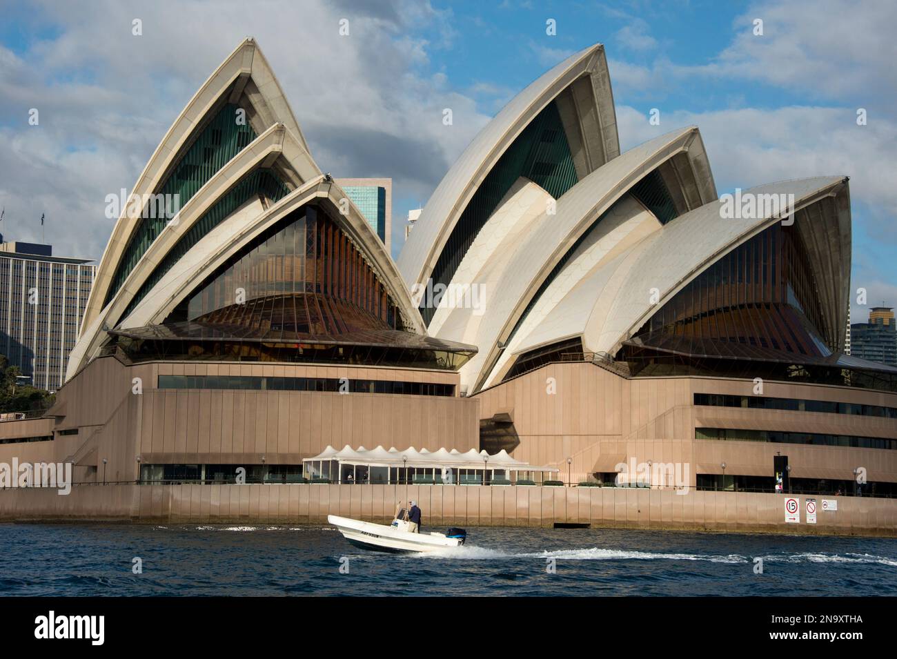 Boat cruises past the Sydney Opera House in Sydney, Australia; Sydney ...