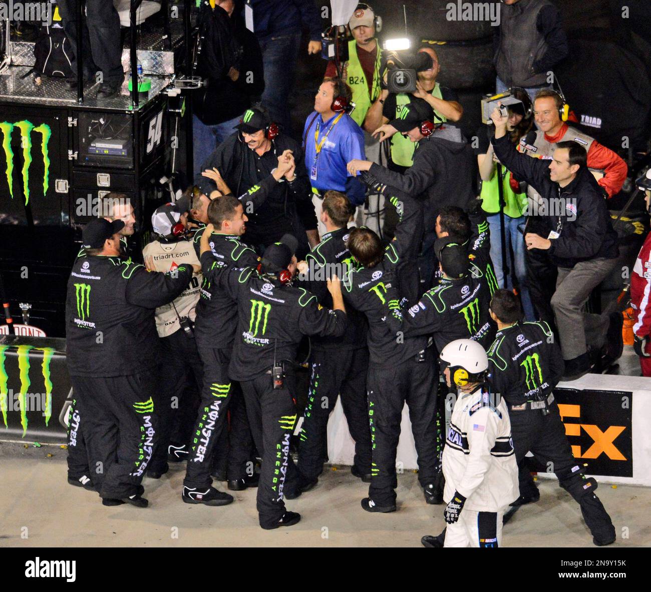The pit crew for Kurt Busch celebrates after he won the NASCAR ...