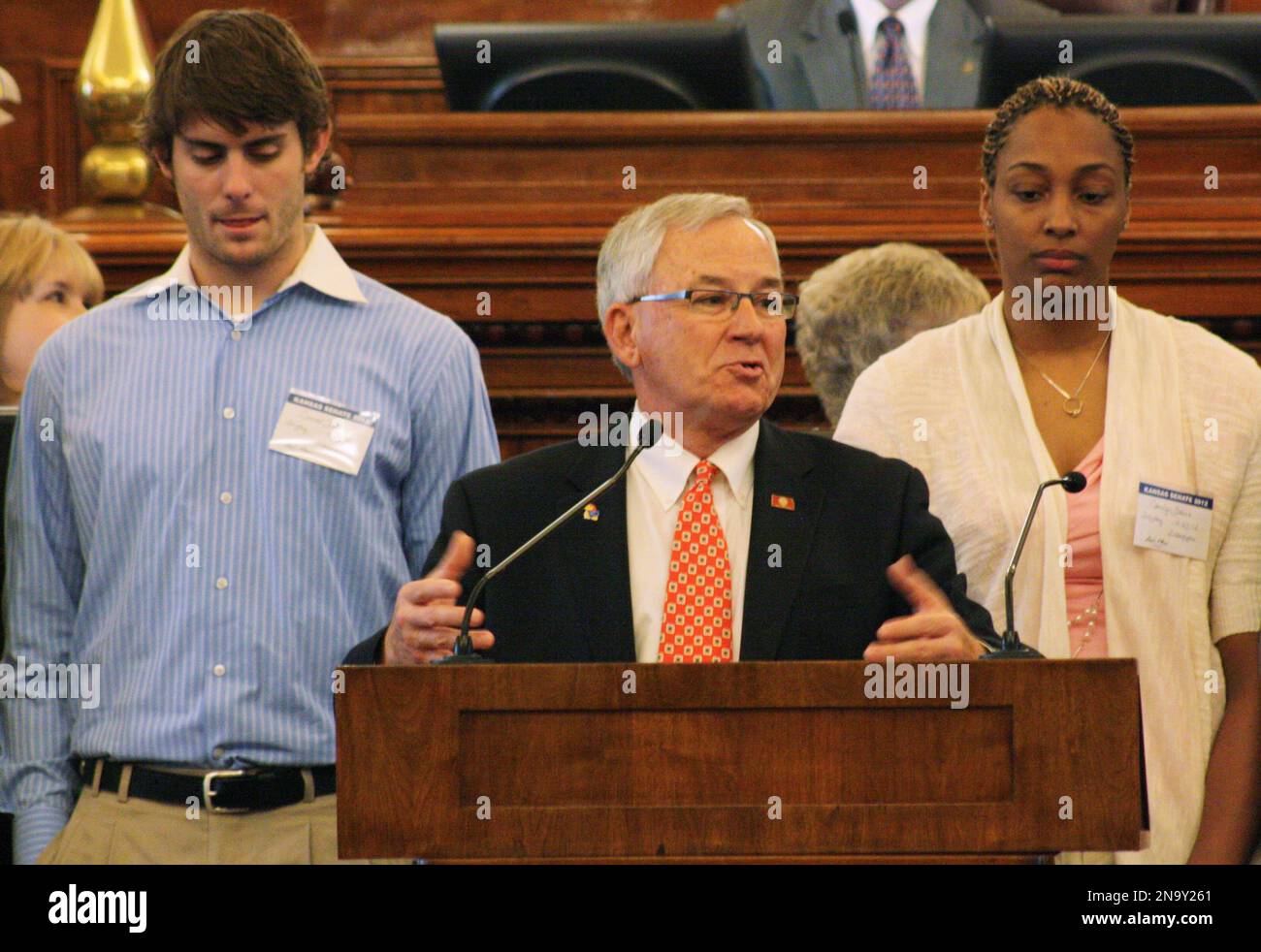 Kansas House Speaker Mike O'Neal, center, is flanked by basketball ...