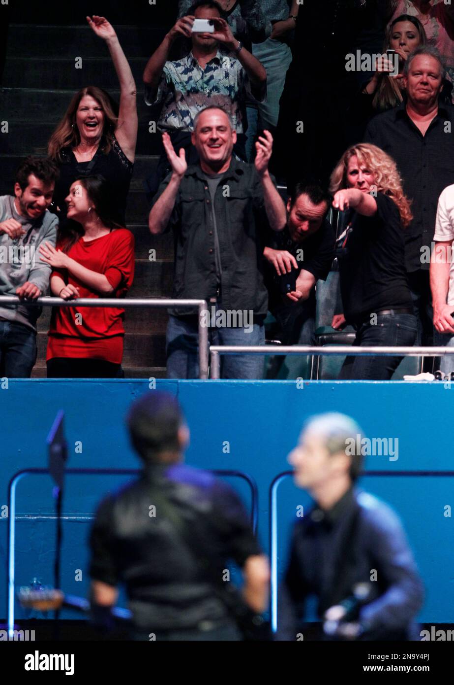Fans cheer as Bruce Springsteen and the E Street Band perform during a ...