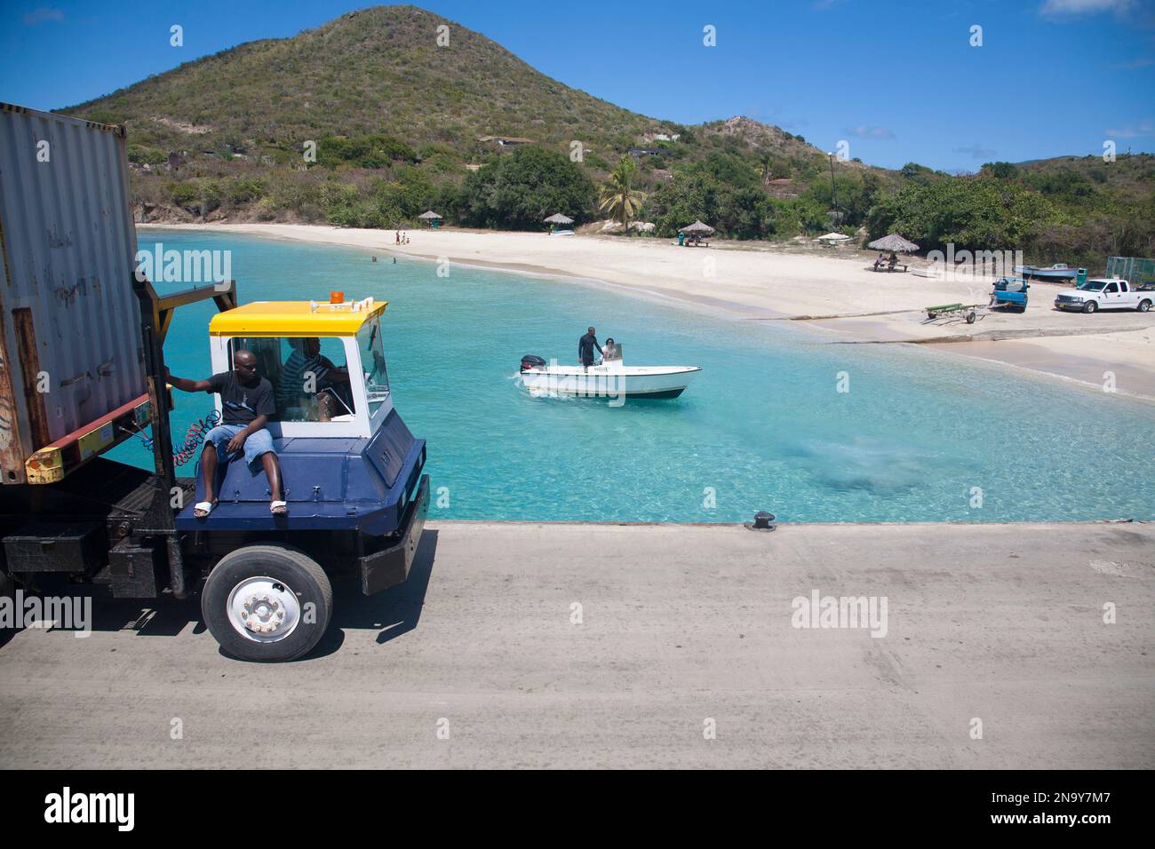 Boat and transport truck at the ferry terminal on Virgin Gorda in the ...
