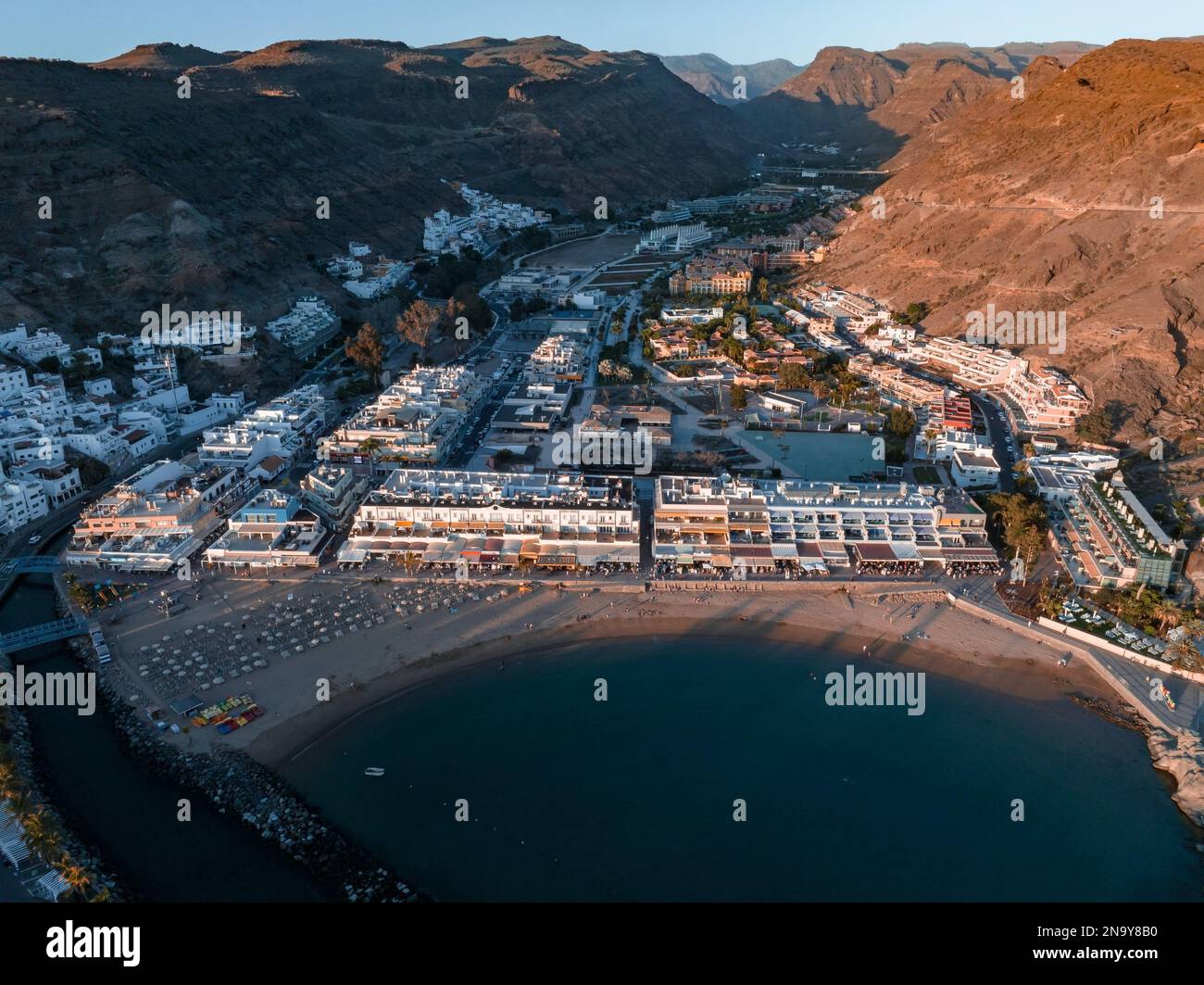 Puerto de Mogan fishing town aerial view at sunset Stock Photo - Alamy
