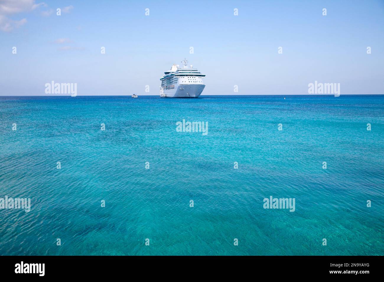Cruise ship waits offshore in the Caribbean Sea at Grand Cayman; Grand ...