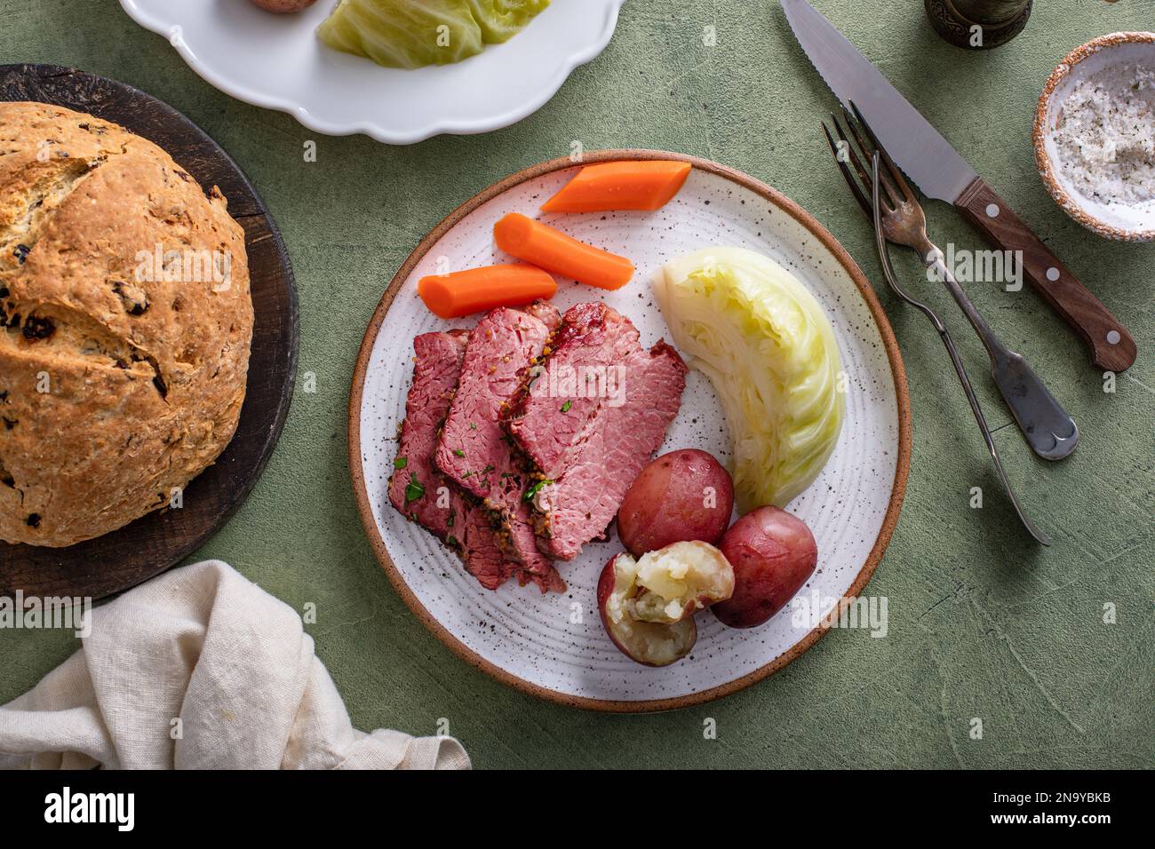 Corned beef with cabbage and potatoes dinner with soda bread, irish ...