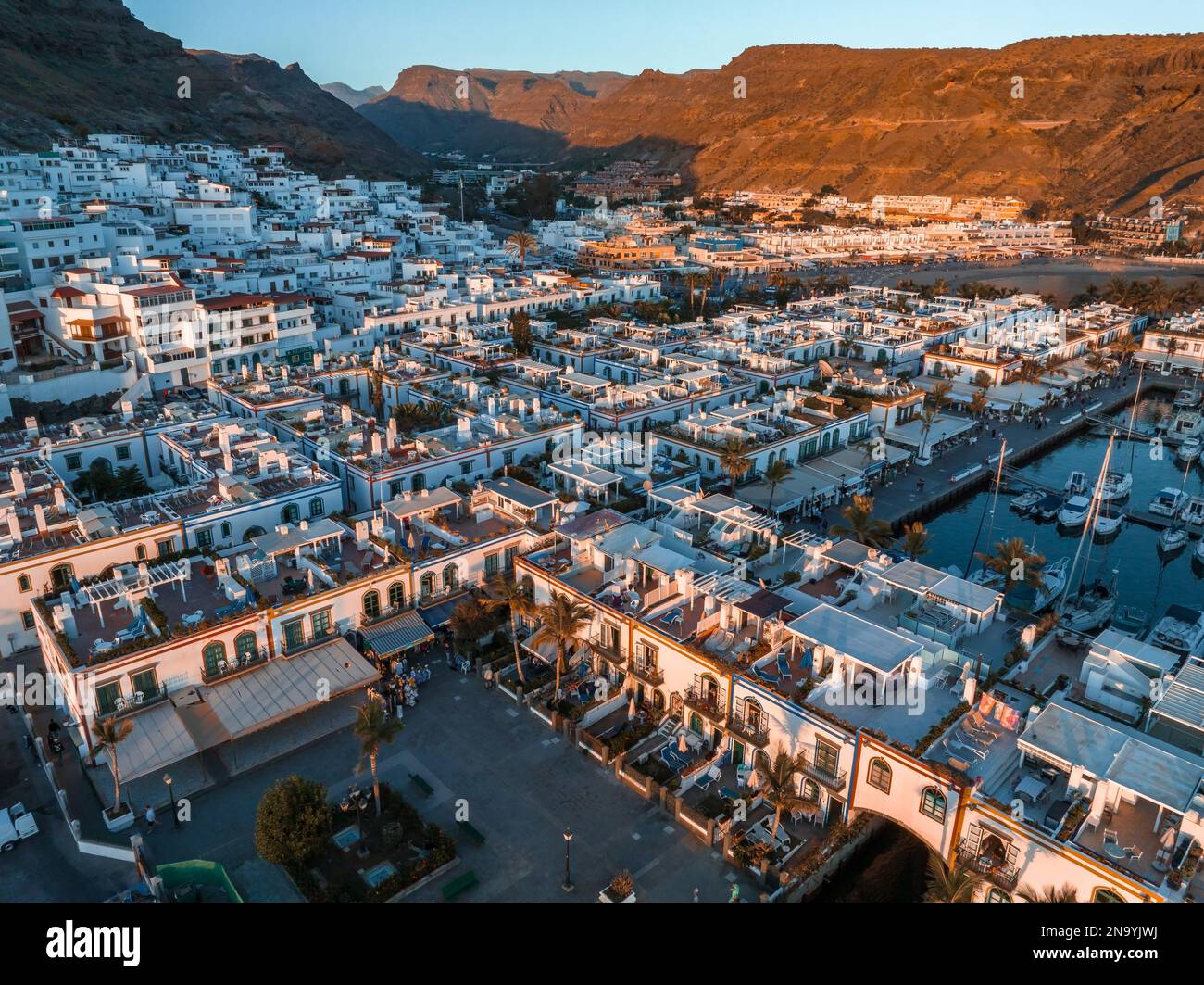 Puerto de Mogan fishing town aerial view at sunset Stock Photo - Alamy