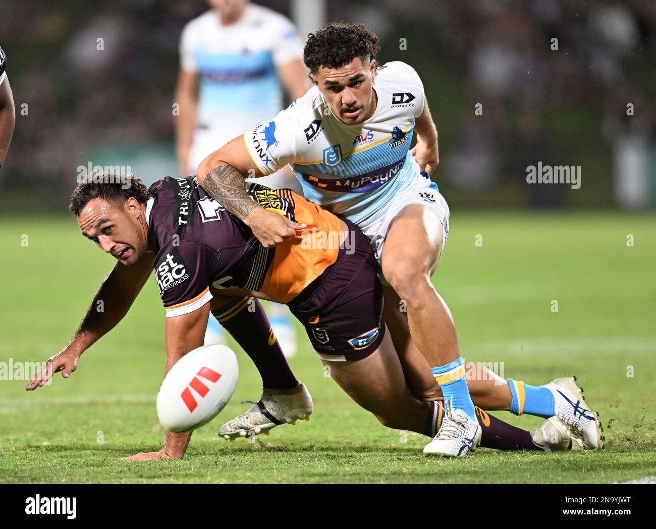 Brendan Frei (left) of the Broncos and Jojo Fifita (right) of the ...