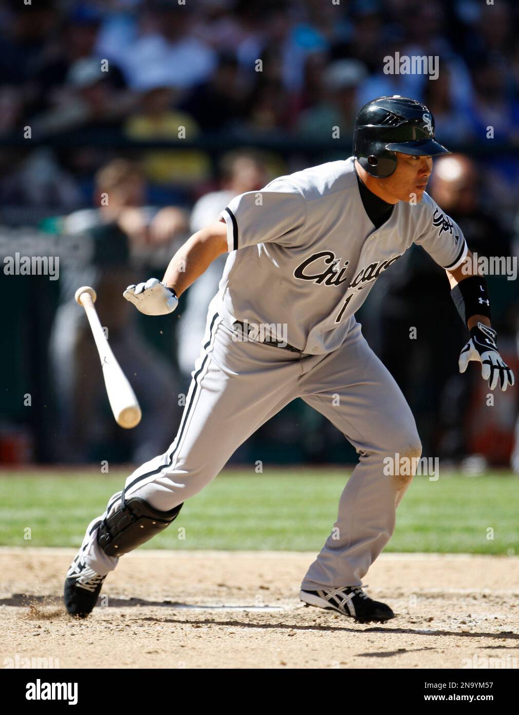 Chicago White Sox's Kosuke Fukudome runs to first after hitting an RBI ...