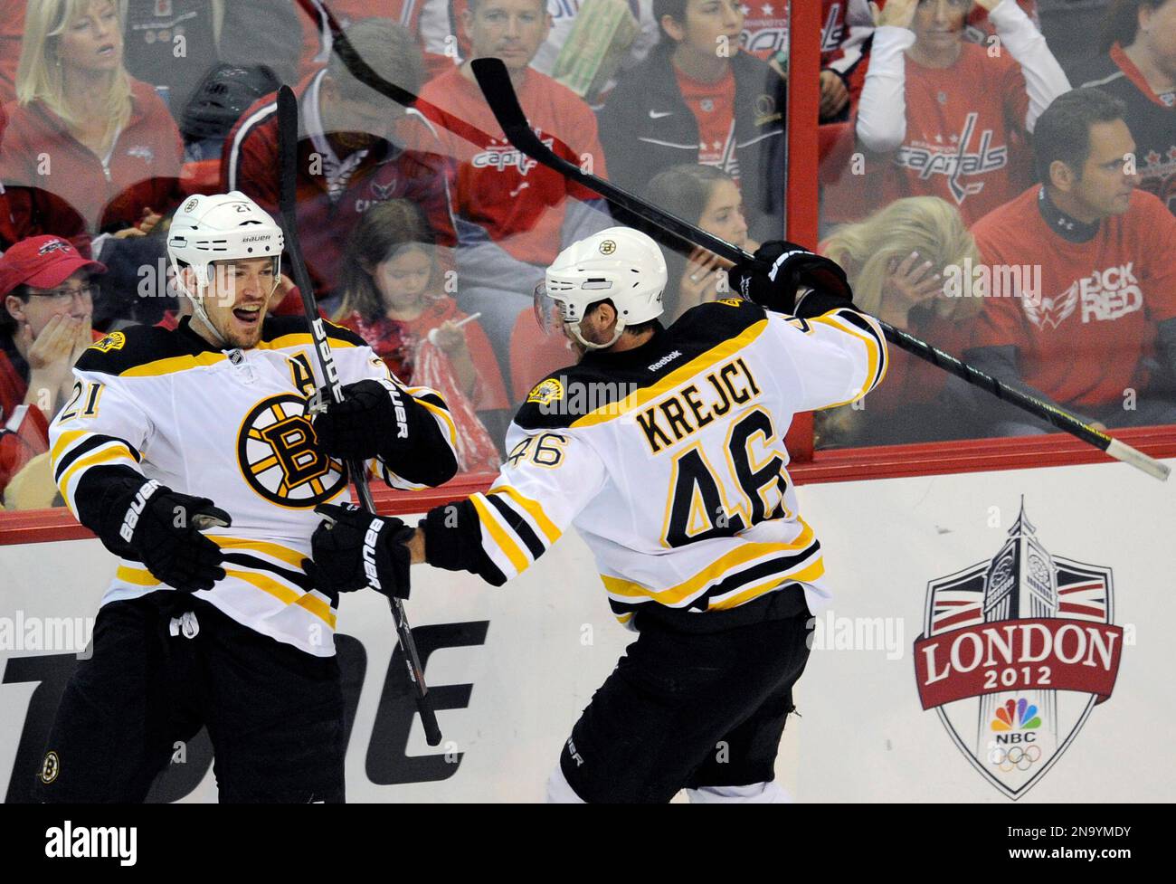Boston Bruins defenseman Andrew Ference (21) celebrates his goal with ...