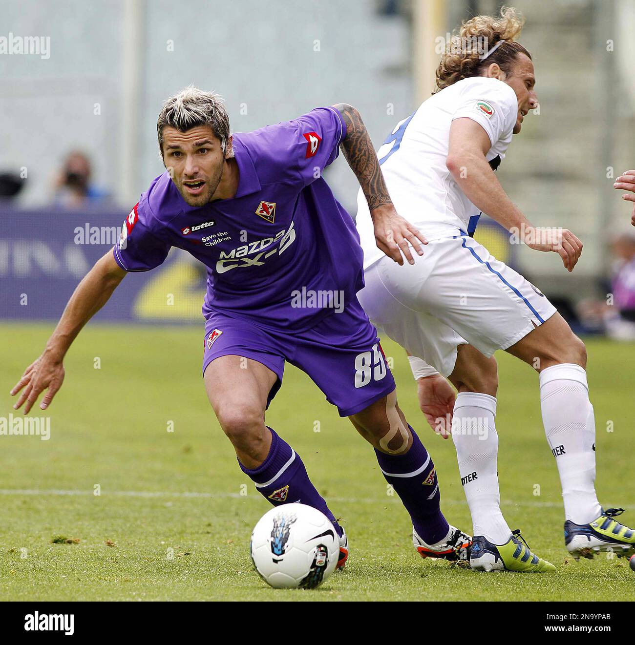 Fiorentina's Valon Behrami of Albania, left, in action with Inter Milan ...