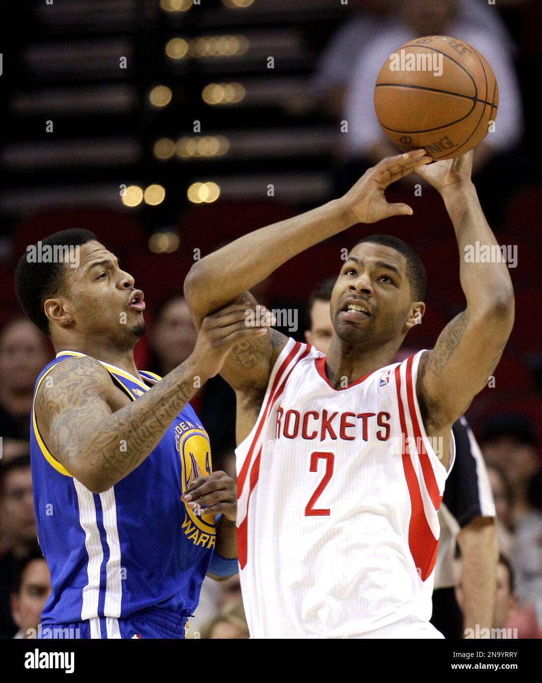 Houston Rockets' Marcus Morris (2) is fouled by Golden State Warriors ...