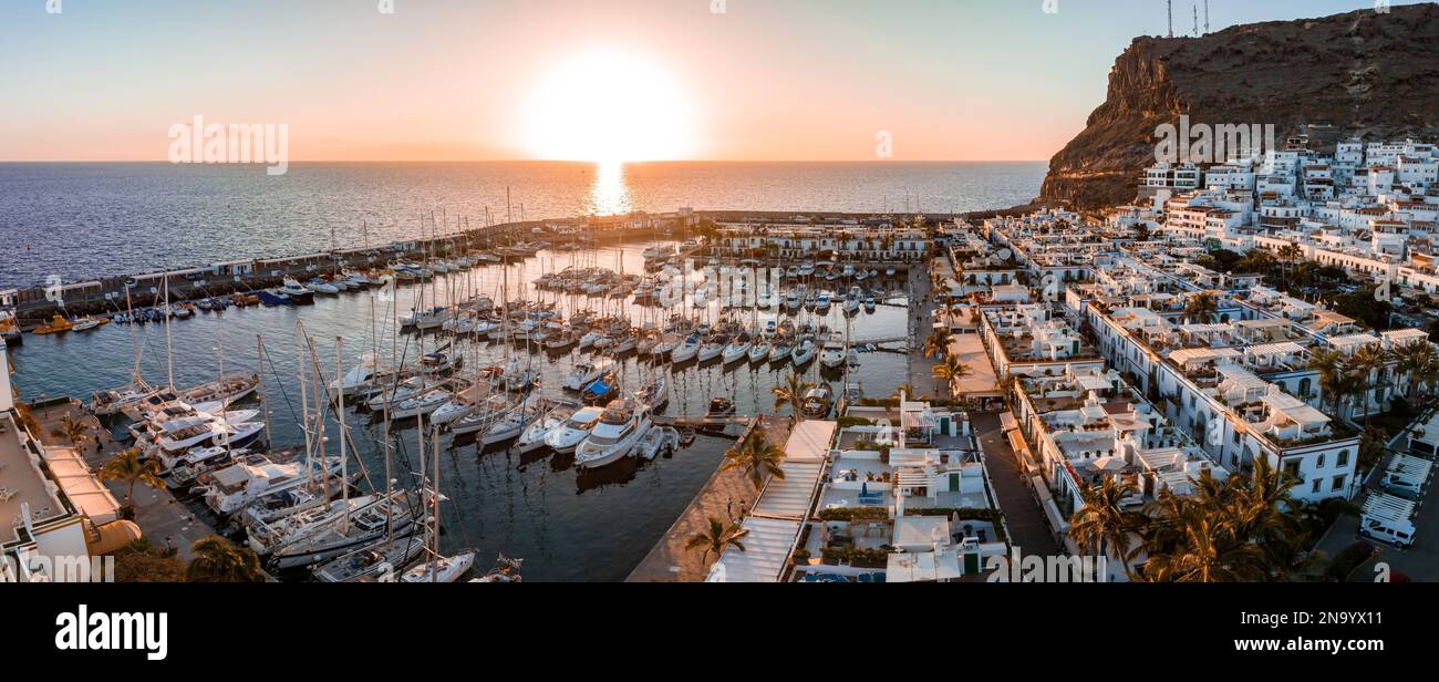 Puerto de Mogan fishing town aerial view at sunset Stock Photo - Alamy