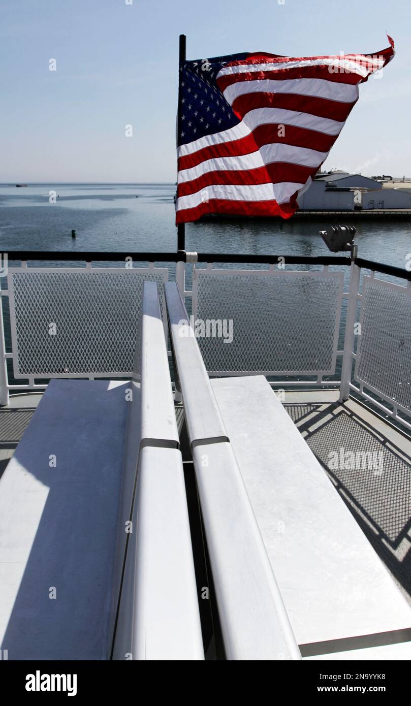 An American flag flaps in the breeze on the deck of the new ferry, Captain E. Frank Thompson, in ...