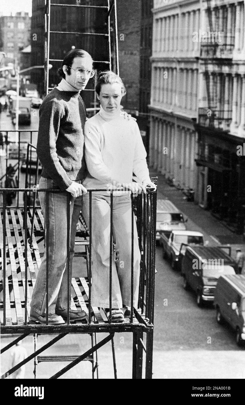 Julie and Stan Patz stand on the fire escape of their loft in the Soho ...