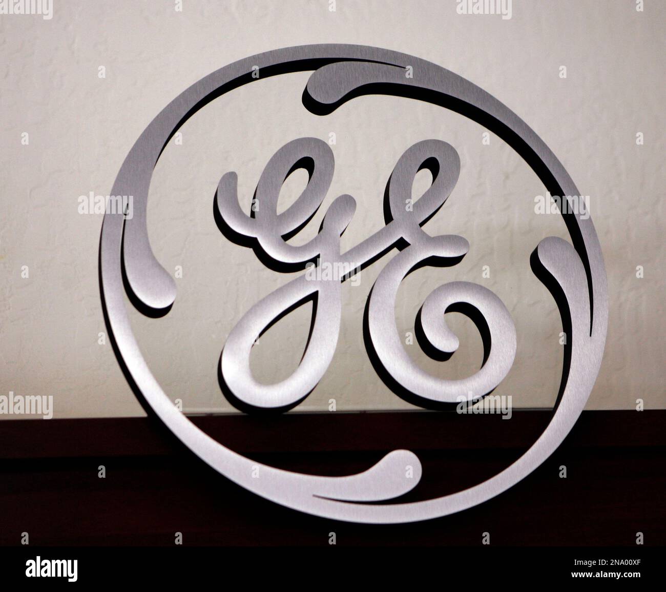 FILE- This Dec. 2, 2008, file photo, shows a General Electric (GE) logo ...