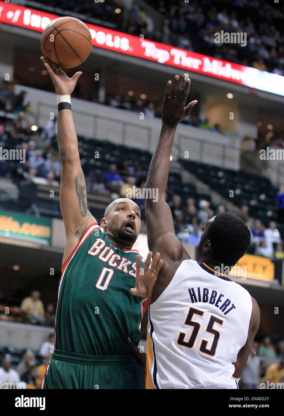 Milwaukee Bucks' Drew Gooden shoots over Indiana Pacers' Roy Hibbert ...