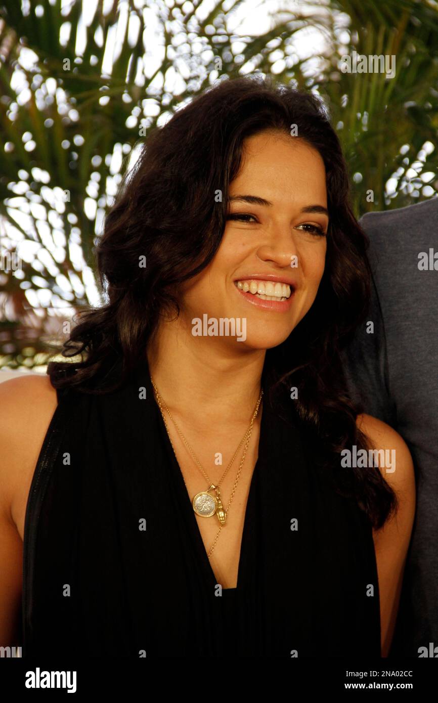 American actress Michelle Rodriguez poses for the press during a ...