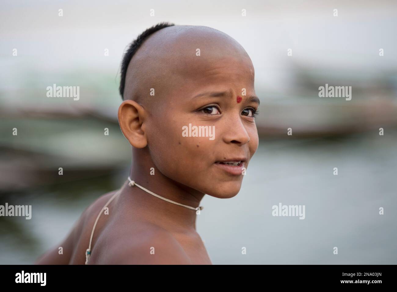 Young pilgrim with shaven head Stock Photo - Alamy