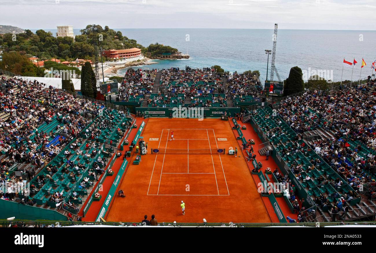 General view of the tennis court and stands with the Mediterranean ...