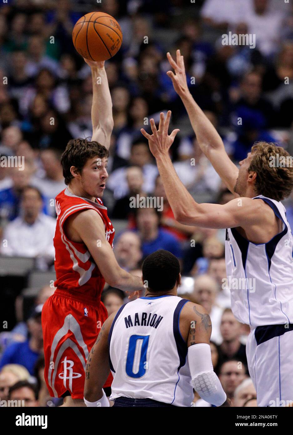 Houston Rockets' Goran Dragic, left, of Slovenia, passes as Dallas ...