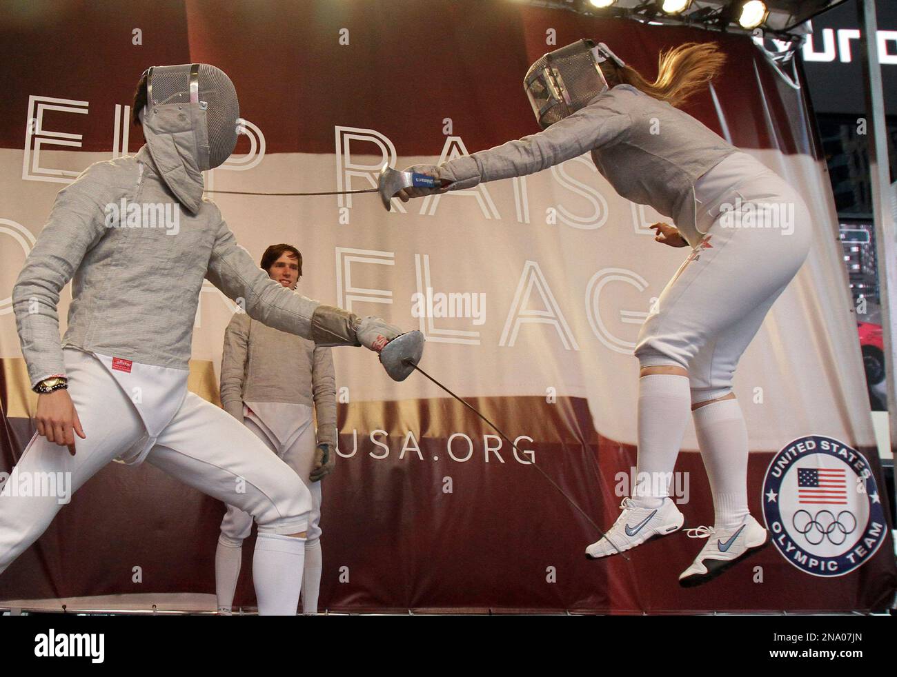 U.S. Olympic fencing team members James Williams, left, and Dagmara ...