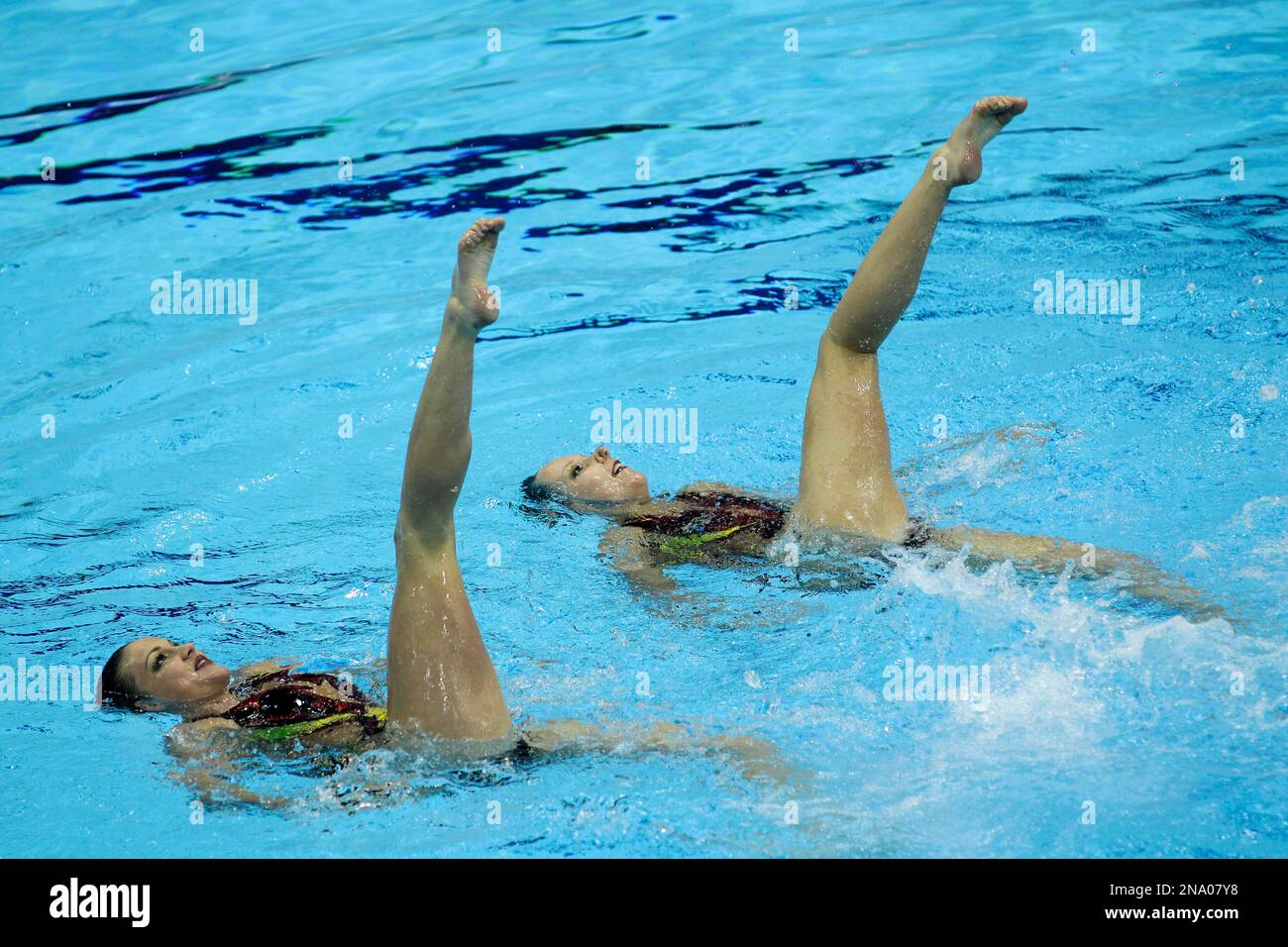U.S.'s Mary Killman and Mariya Koroleva perform their duets technical ...