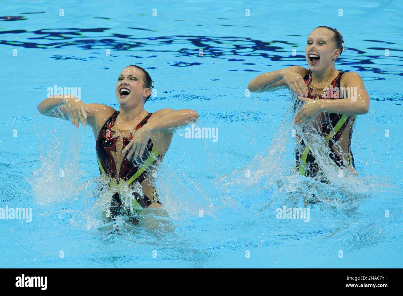 U.S.'s Mary Killman and Mariya Koroleva perform their duets technical ...