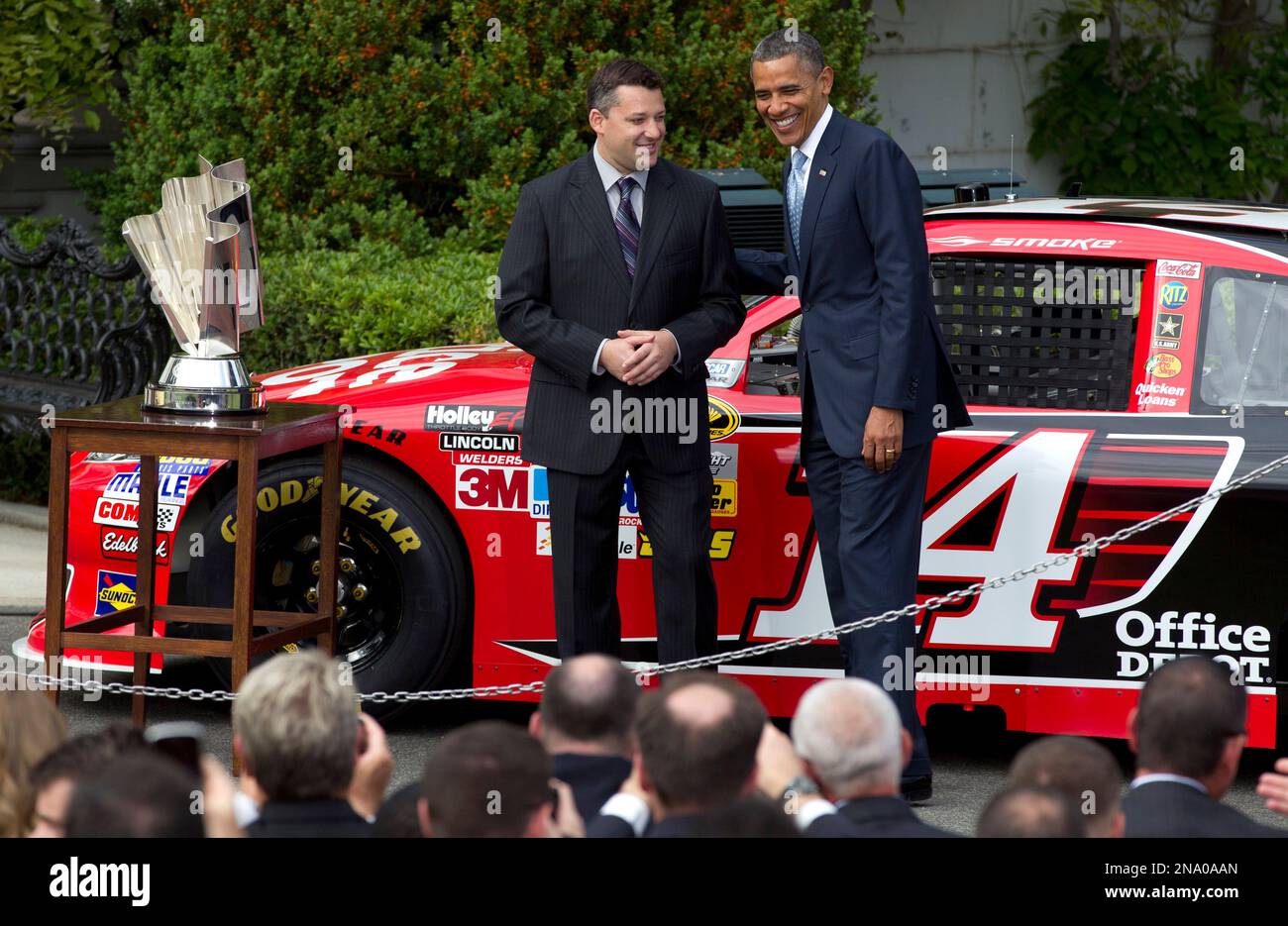President Barack Obama, right, talks with NASCAR driver Tony Stewart ...