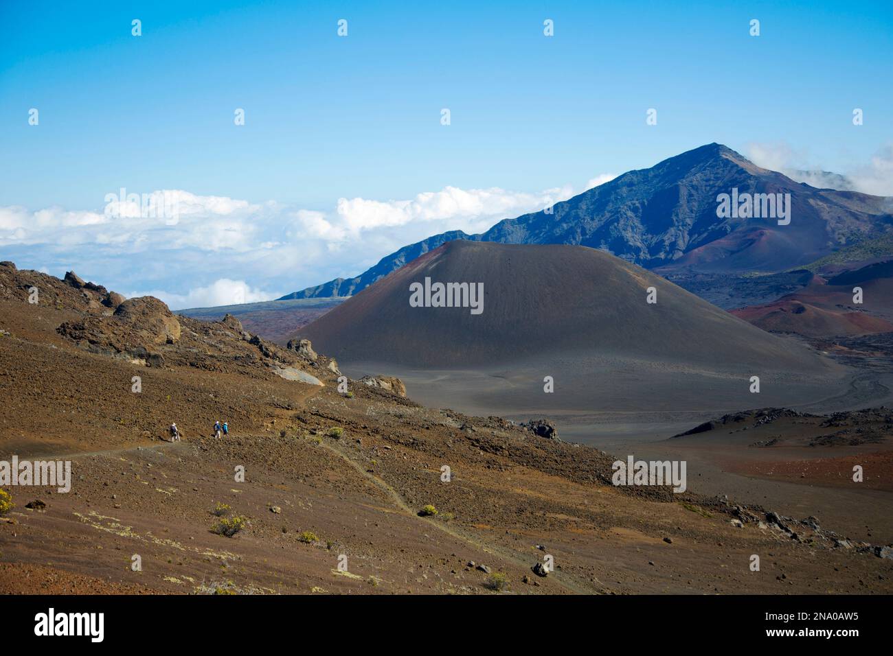 Hikers on Sliding Sands trail in Haleakala Crater, Maui, Hawaii MNR ...