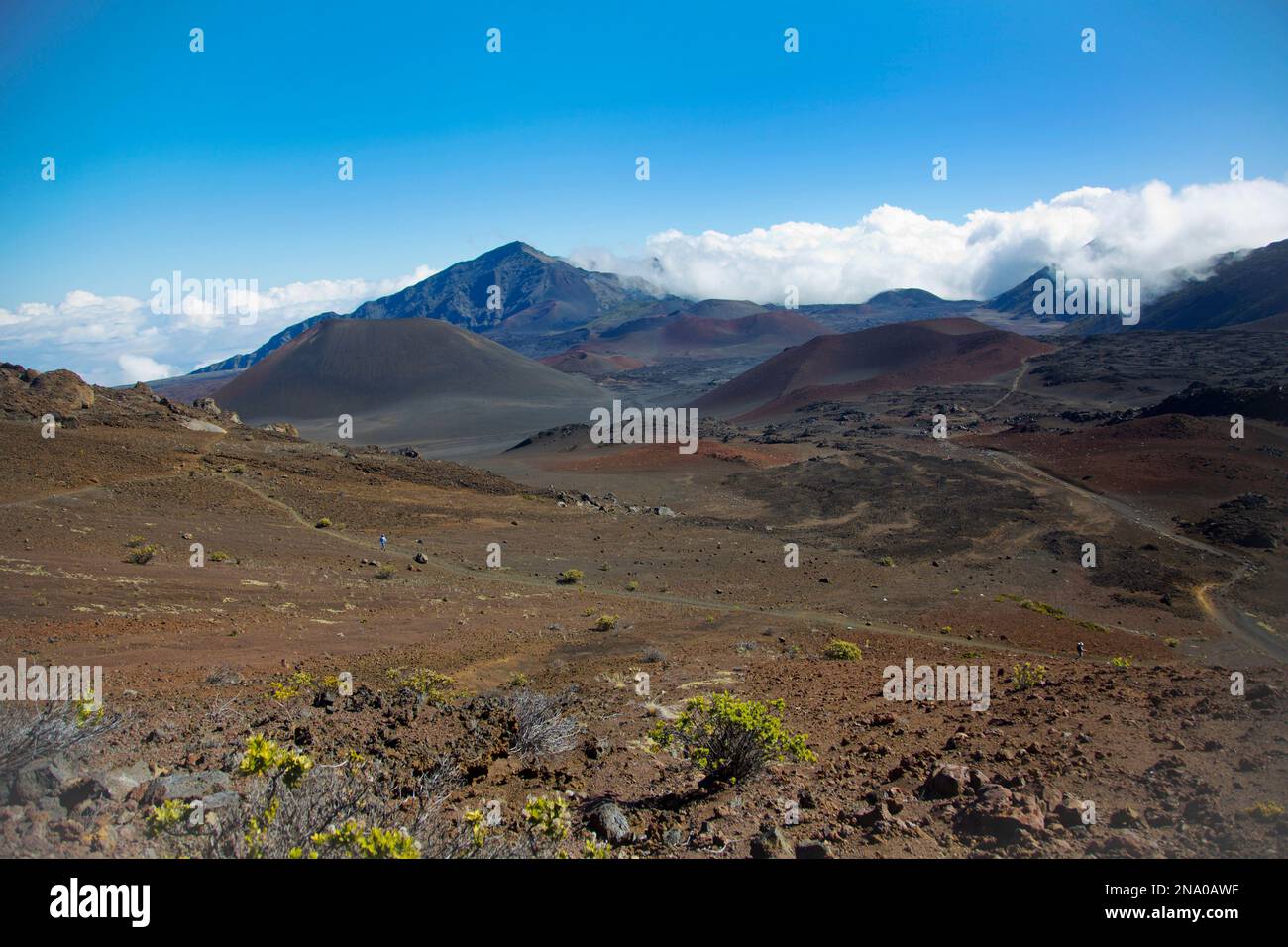 Hikers on Sliding Sands trail in Haleakala Crater, Maui, Hawaii MNR ...