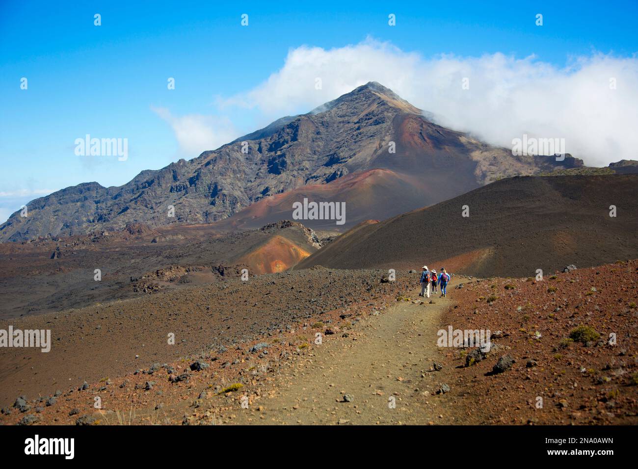 Hikers on Sliding Sands trail in Haleakala Crater, Maui, Hawaii MNR ...