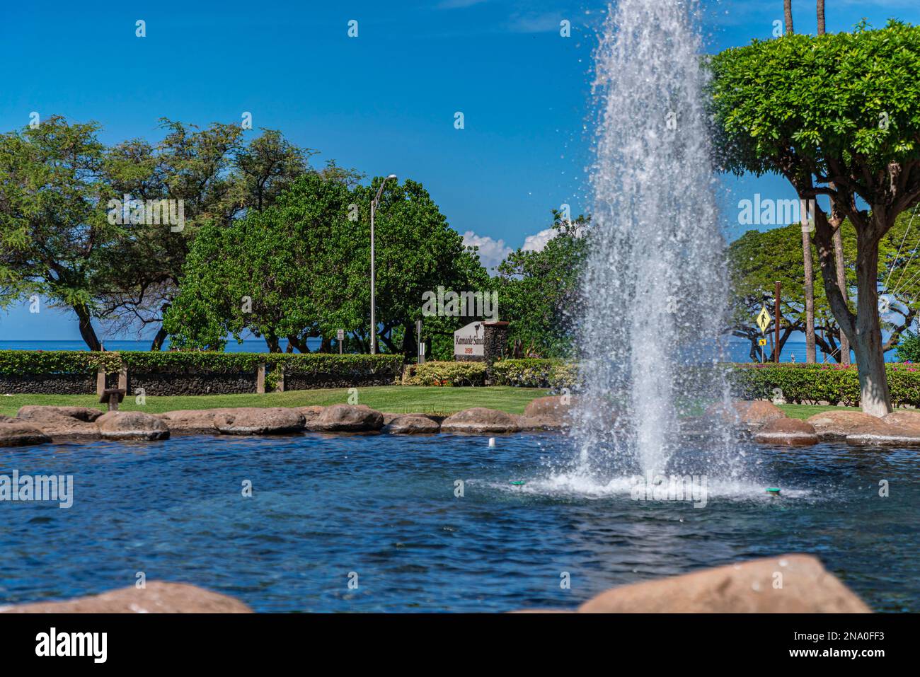 Fountain in a pond at Kamaole Beach III in Kamaole Beach Park, Kihei ...