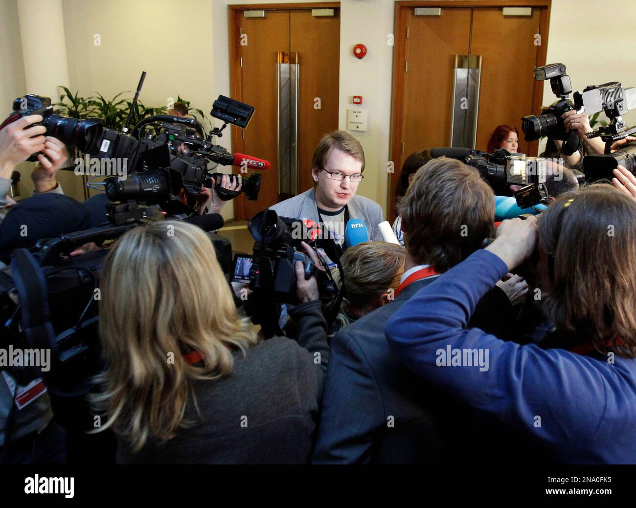 Utoya shooting survivor Tore Sinding Bekkedal, center, speaks to the ...