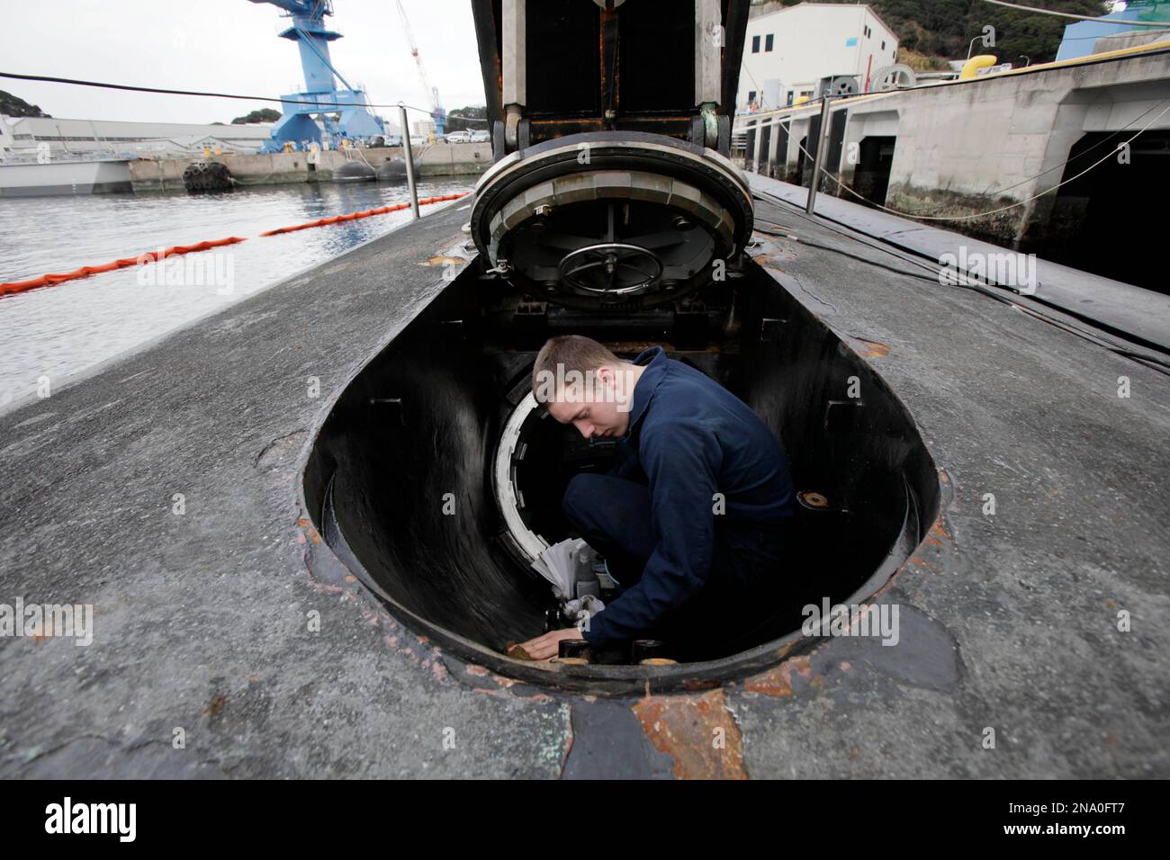 In this Monday, March 12, 2012 photo, Sonar Technician James Corriveau ...