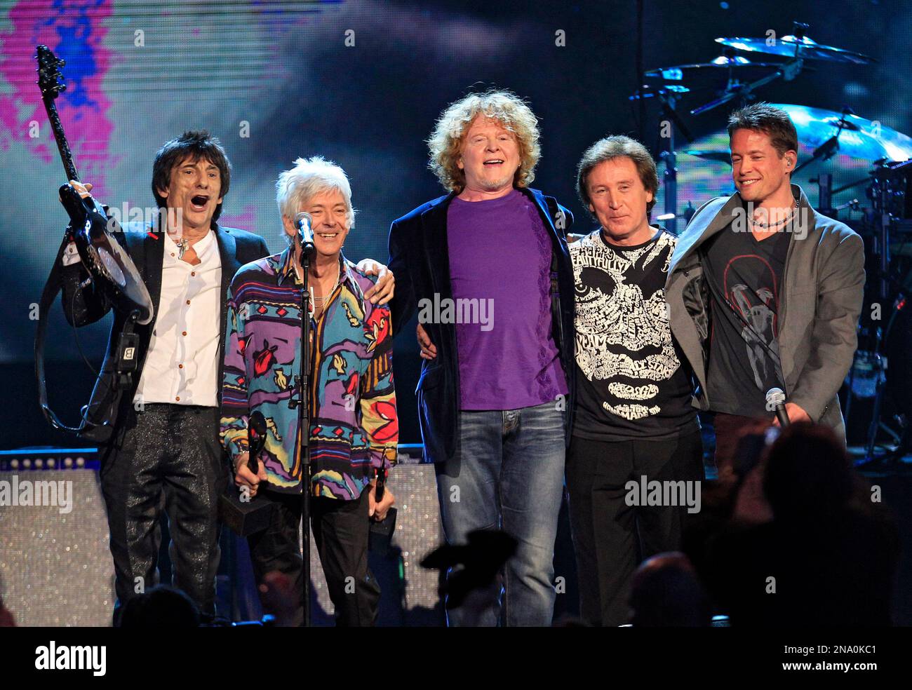 Small Faces/Faces members Ron Wood, left, Ian McLagan, second from left ...