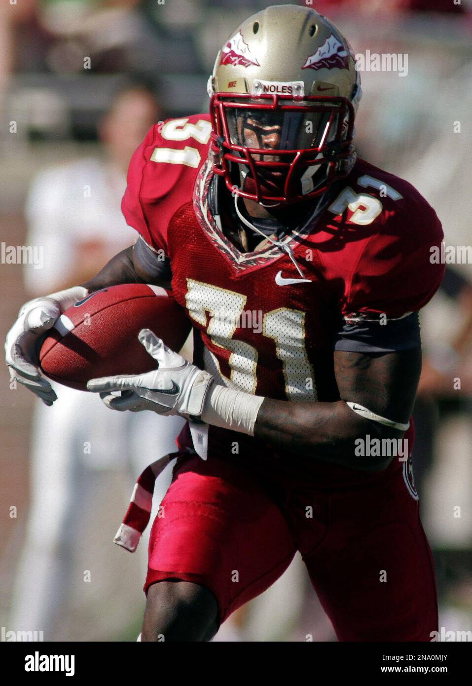 Florida State's Terrence Brooks (31) returns an interception 51 yards ...