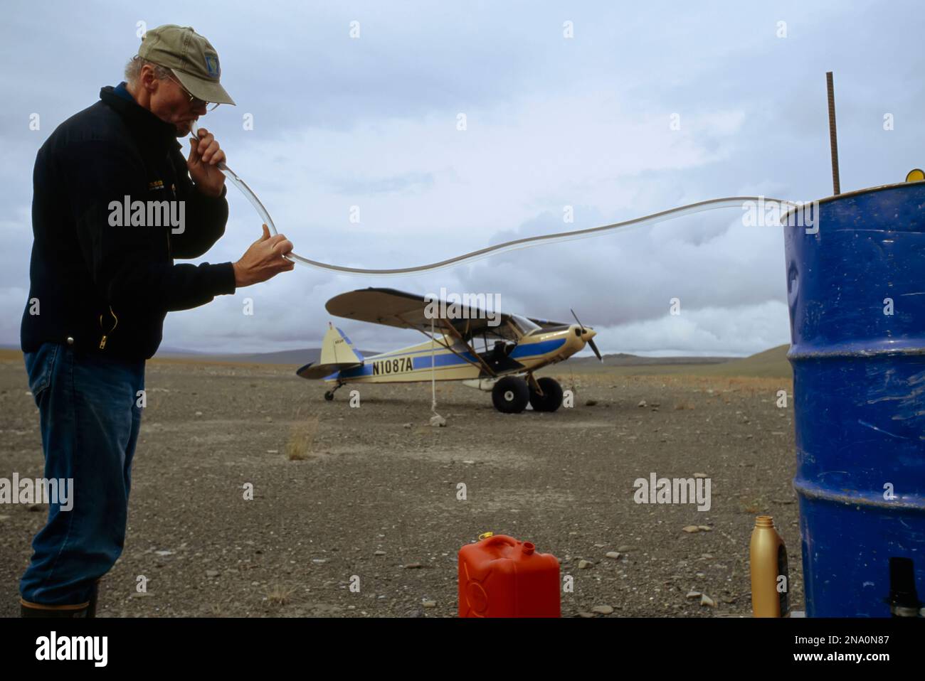 Siphoning gas hi-res stock photography and images - Alamy