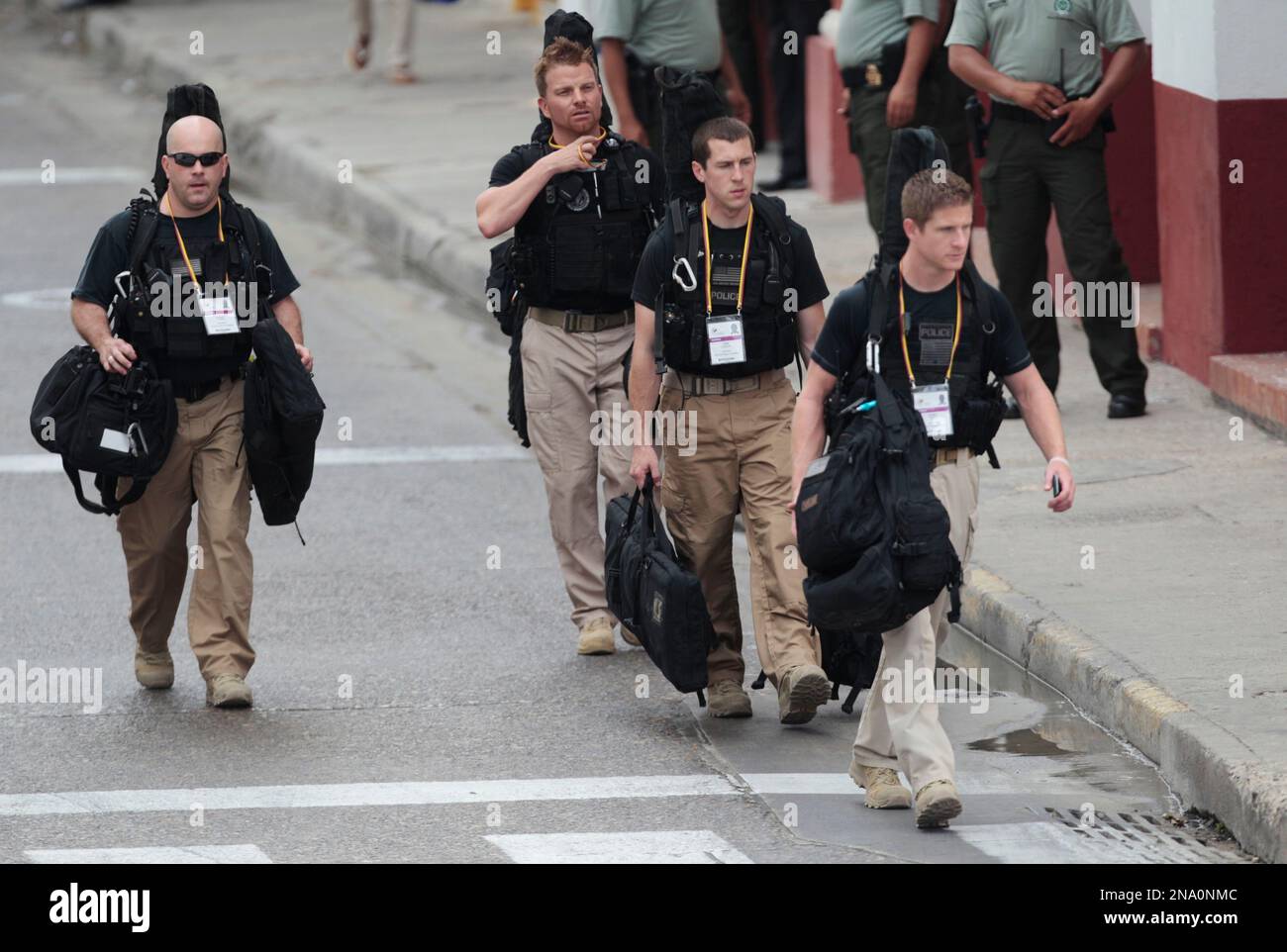 U.S. secret service agents walk around the Convention Center in ...