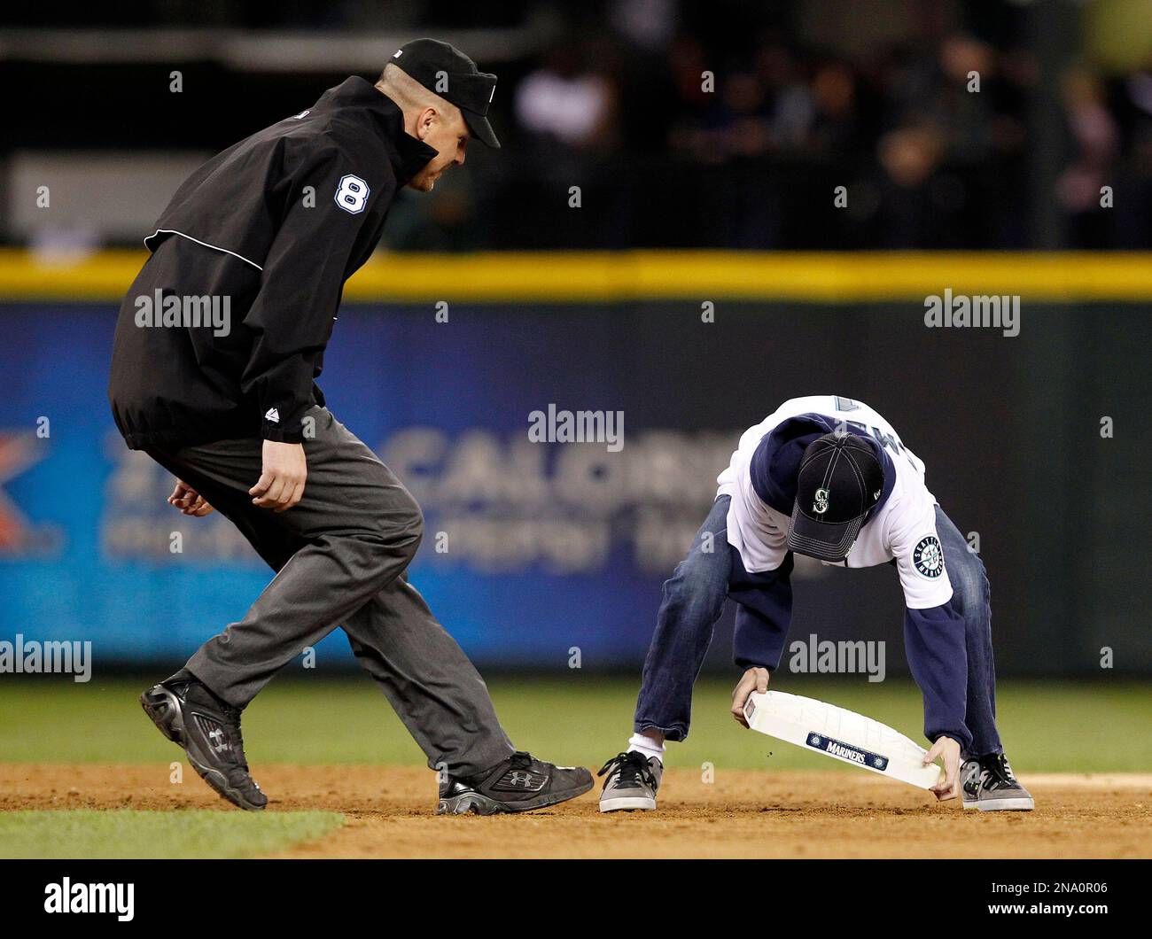 U.S. Army 1st Sgt. Steve Smerer, left, races over to surprise his son ...