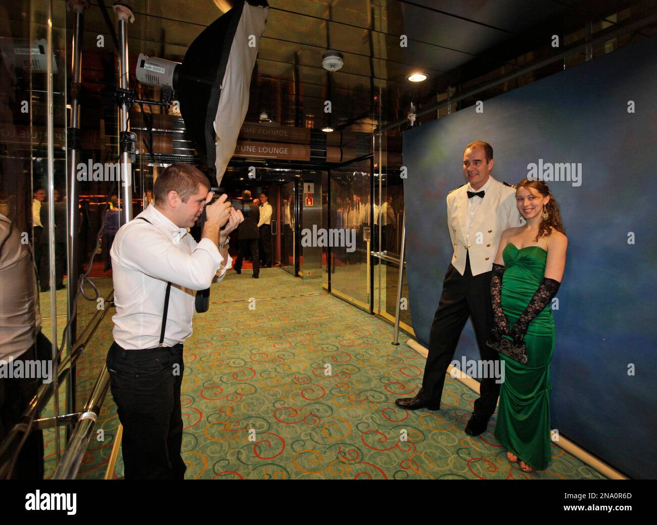 Passenger Robin Paterson from Halifax, Canada, poses for pictures with ...