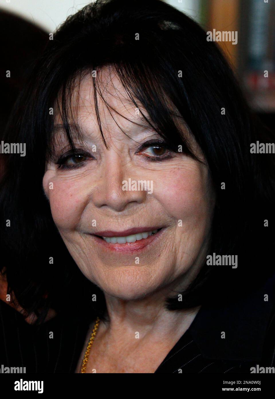 French actress and singer Juliette Greco attends a ceremony to receive ...