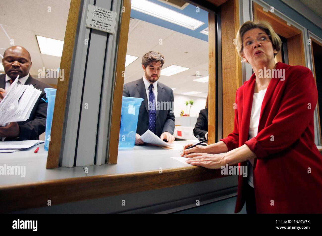 Democratic U.S. Senate hopeful Elizabeth Warren, right, looks up while ...