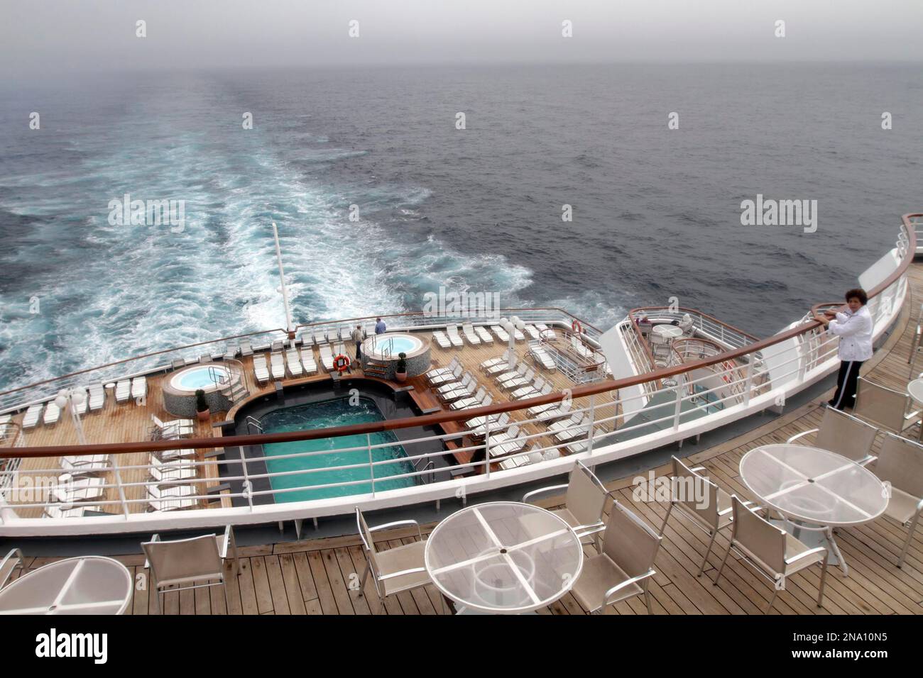 A passengers enjoys the view on the deck aboard the MS Balmoral Titanic ...