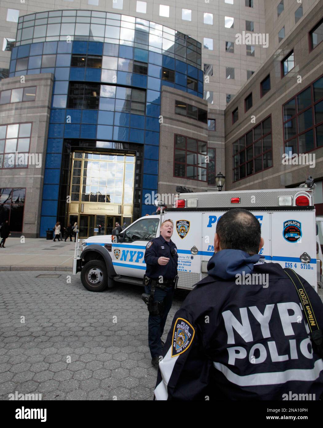 Police vehicles occupy the roadway at the entrance to 2 World Financial ...
