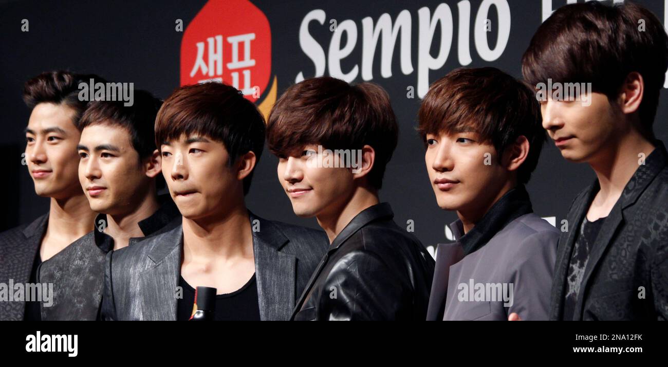 South Korean boy band 2PM members pose for photo during a press ...