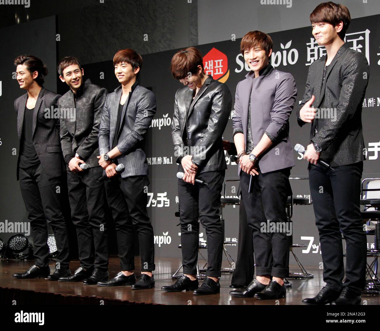 South Korean boy band 2PM members pose for photo during a press ...