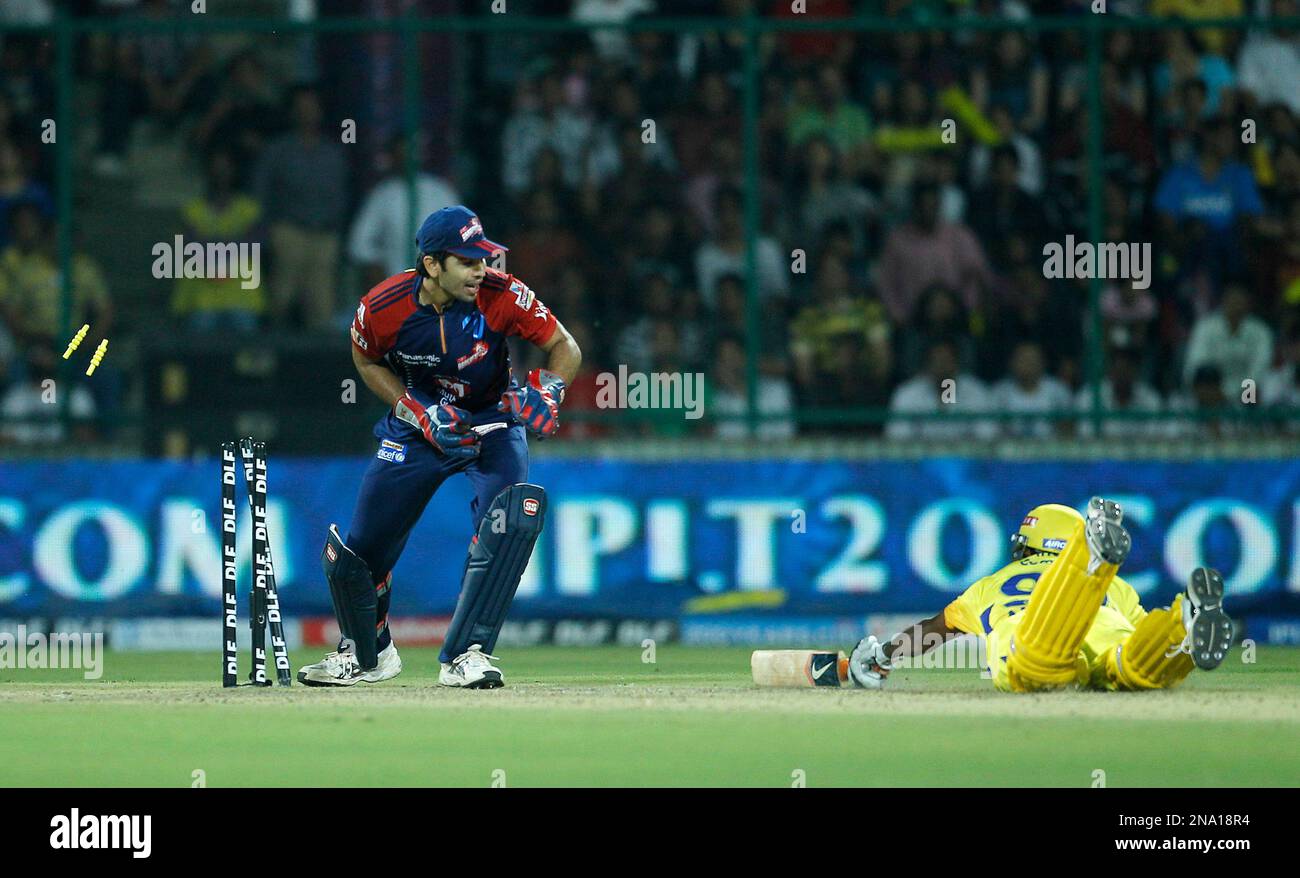 Naman Ojha of Delhi Daredevils, left, affects the runout of ...